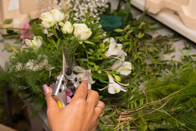 Florist at Work stock image. Image of making, person - 140430101