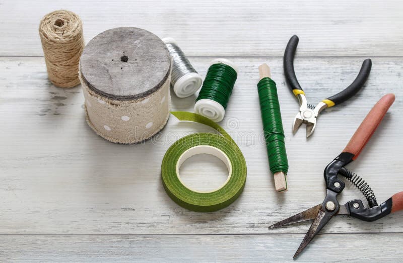 Florist Tools And Workplace With Ribbons, Flowers And Scissors Stock ...