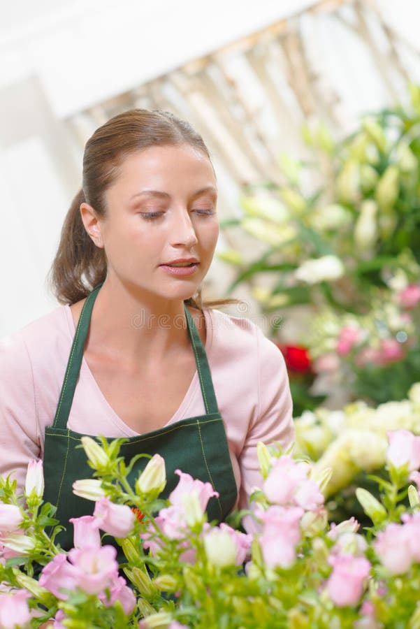 Florist stood in boutique stock photo. Image of gardener - 73096188