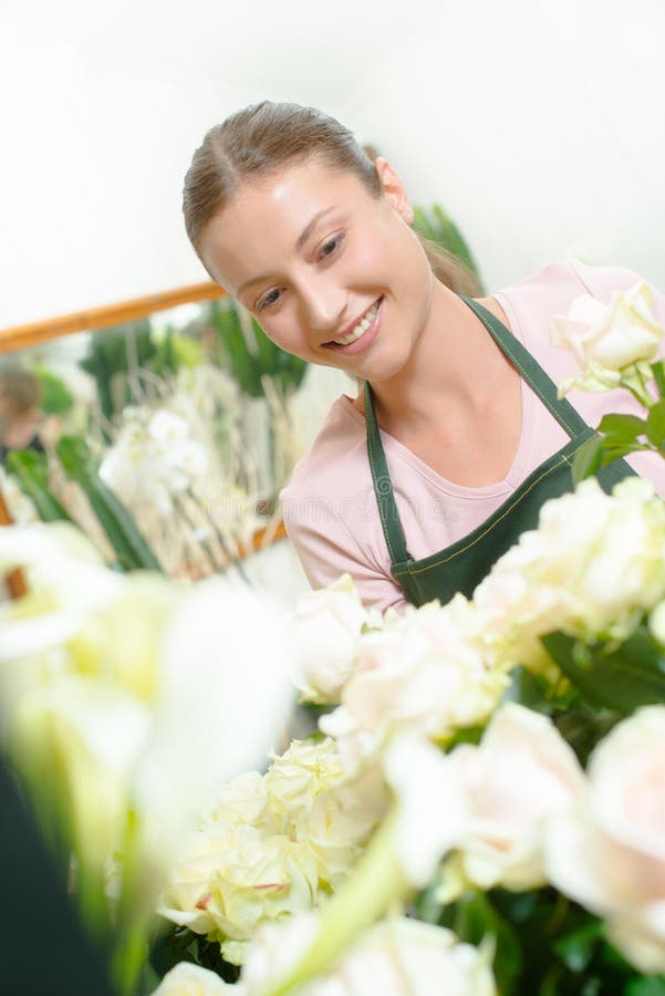 Florist stood in boutique stock photo. Image of apron - 88084410