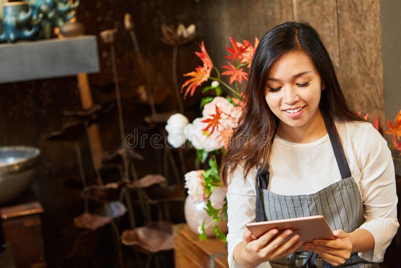 Florist with Tablet Accepts Online Order Stock Photo - Image of online ...