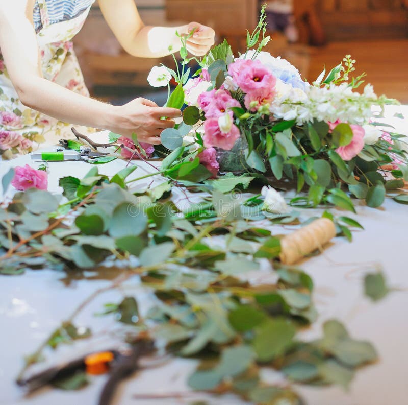 Florist woman at work stock photo. Image of profession - 75186702