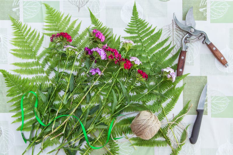 Florist Workplace. Flowers and Tools To Create a Bouquet Stock Image ...