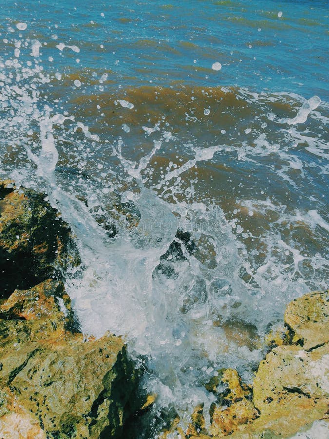 Flouch stock image. Image of rocks, flouch, water, beach - 161602137