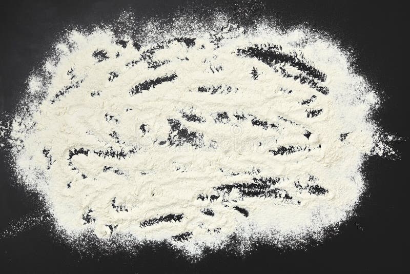 Flour on a Black Background. Top View. Close Up Stock Image - Image of ...