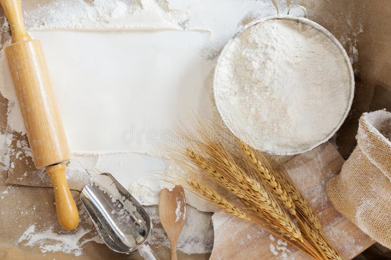 Flour in a Bowl and Wheat Grains with Wheat Ears on the Table, Paper ...