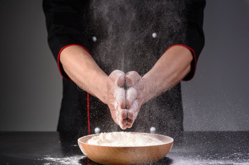 Flour and Chef in a Black Tunic1 Stock Photo - Image of tunic, wheel ...