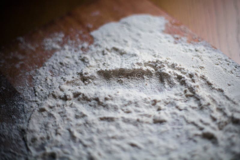 Flour on a cutting board stock image. Image of layer - 40967283