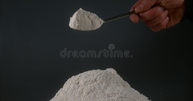 Flour Falling Against Black Background Stock Photo - Image of ...