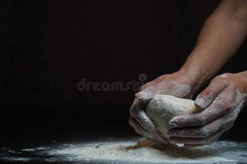 Flour Falling on a Dark Table. Preparing the Homemade Bread Making ...
