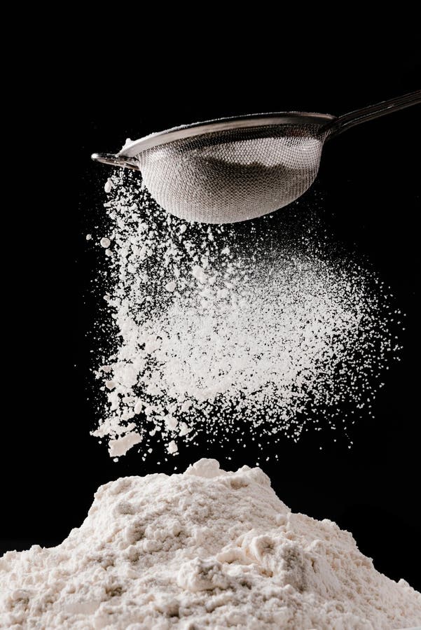 Flour Falling from Sieve on Pile Stock Photo - Image of falling ...