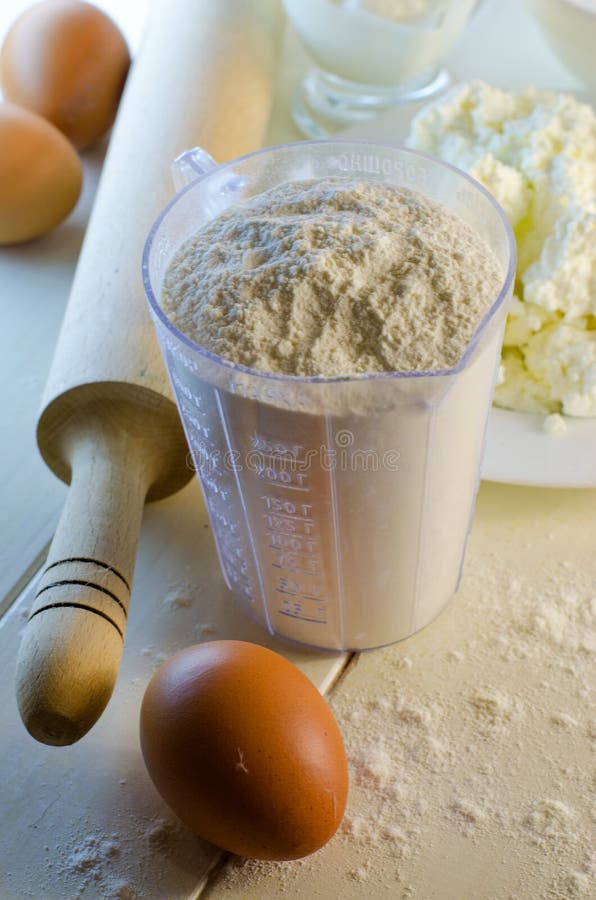 Flour into measuring cup stock photo. Image of cakes - 86263920