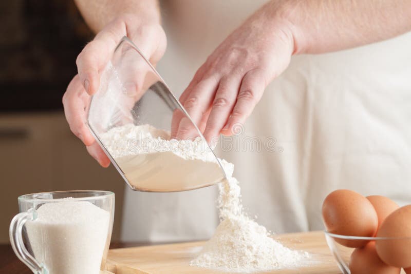 Flour Pours from a Glass Plate in Preparation for Test Stock Photo ...