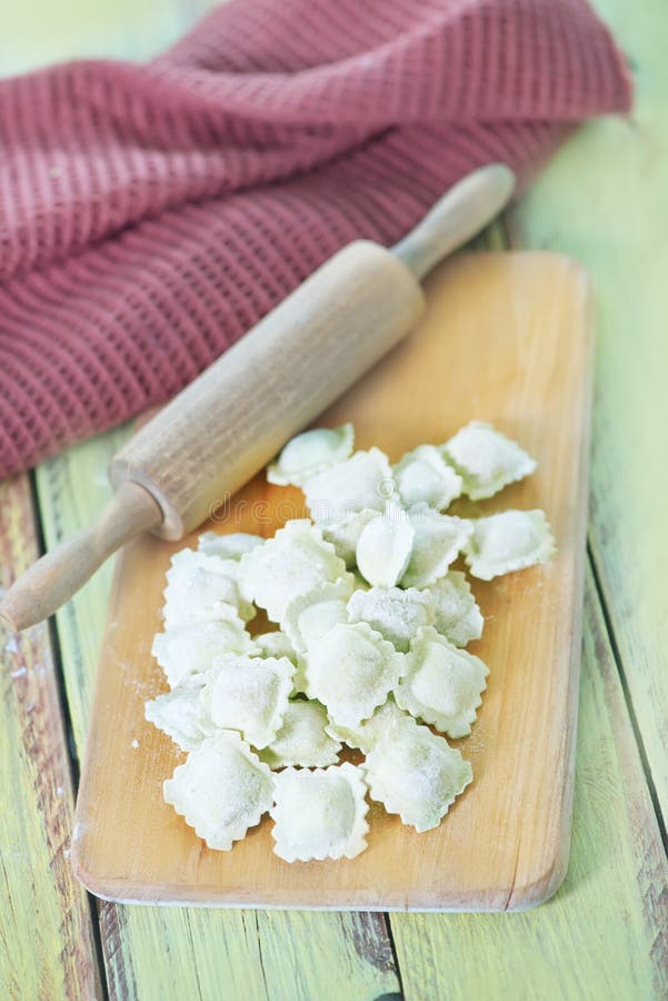 Flour and raw ravioli stock photo. Image of heap, prepared - 55504222