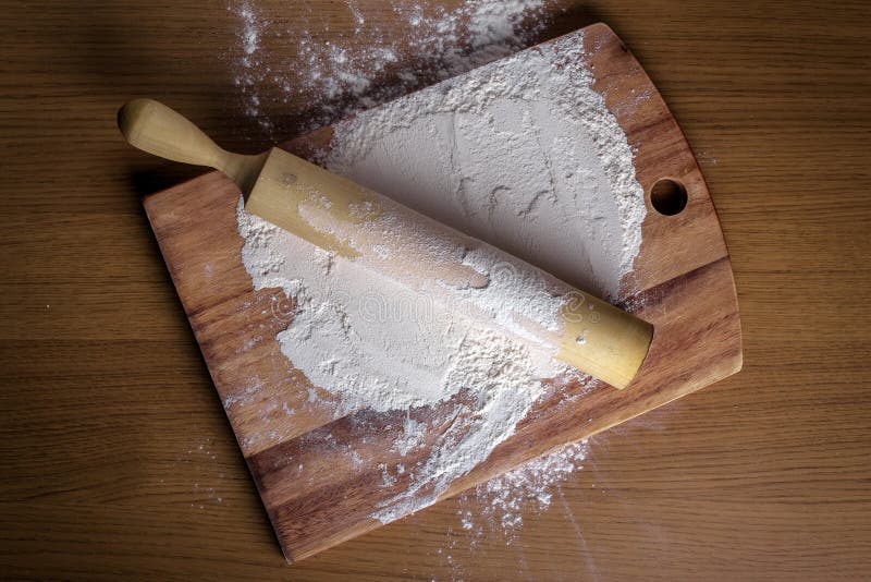 Flour with a Rolling Pin on Cutting Board Stock Image - Image of area ...