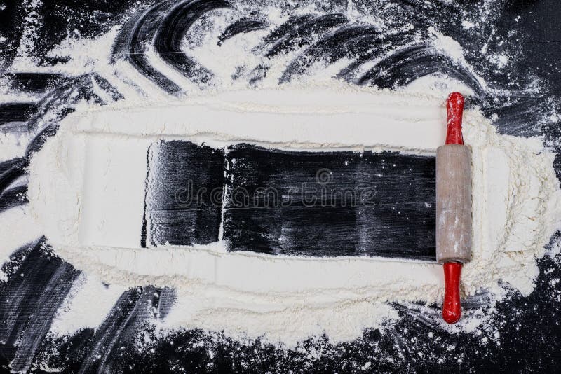 Flour and Rolling Pin for Kneading the Dough on the Kitchen Table ...