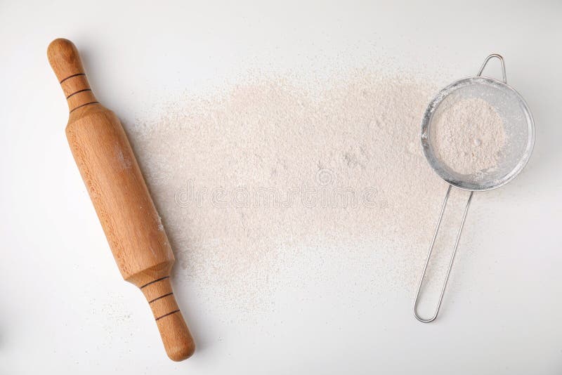 Flour, Rolling Pin and Sieve on White Table, Flat Lay Stock Image ...