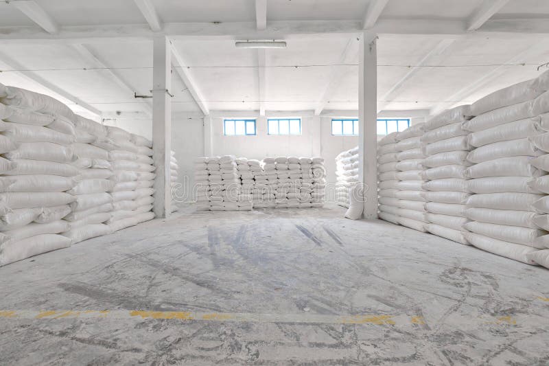Flour Sack Storage Facility with Organized Stacks and Bright Daylight ...