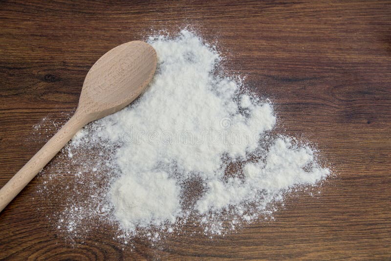 Flour and spoon stock image. Image of cooking, kitchenware - 53995711
