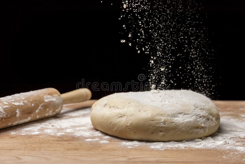 Flour sprinkled on dough. stock photo. Image of fresh - 83899716