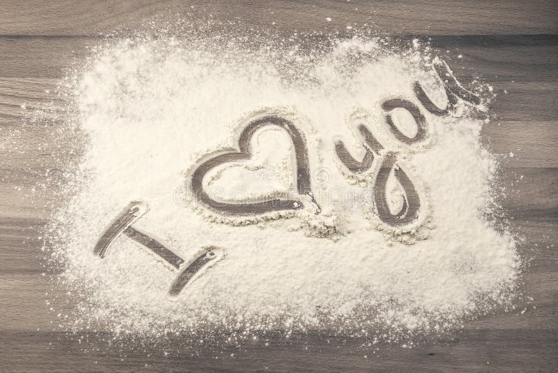 Hearts and a Key of the Flour As a Symbol of Love on Wooden Background ...