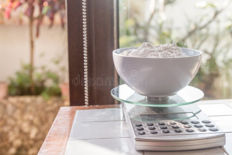 Flour on weighing scale stock image. Image of bakery - 53154189