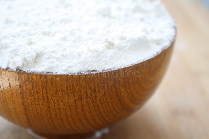 Flour in wooden bowl. stock photo. Image of food, pattern - 28429818