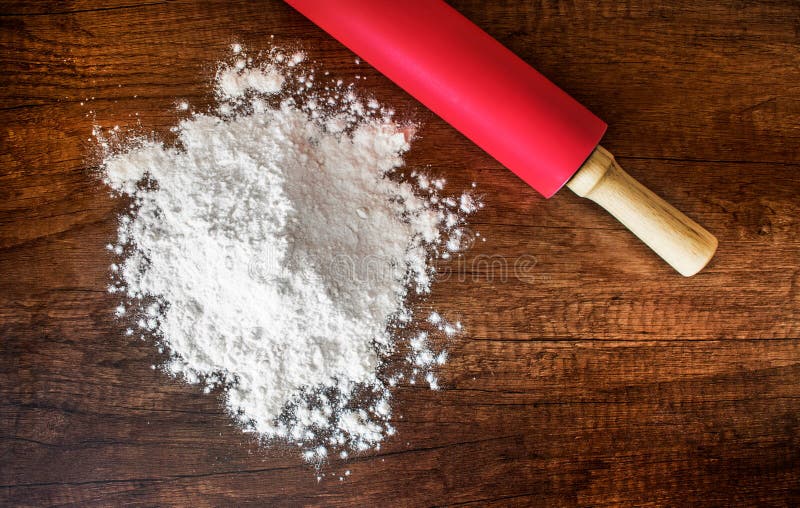 Flour on a wooden table stock image. Image of rolling - 133443087