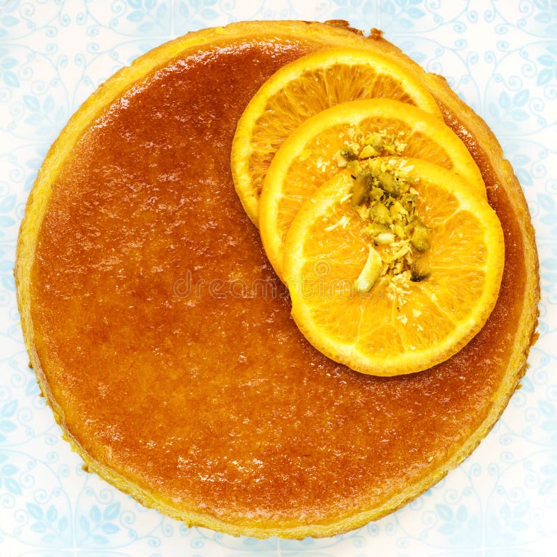 Flourless Orange Cake Top View on Blue Pattern Plate Stock Photo ...