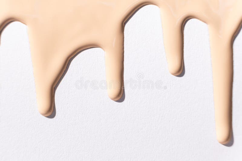 Flow Foundation on a White Background, Art in Cosmetics. Stock Image ...