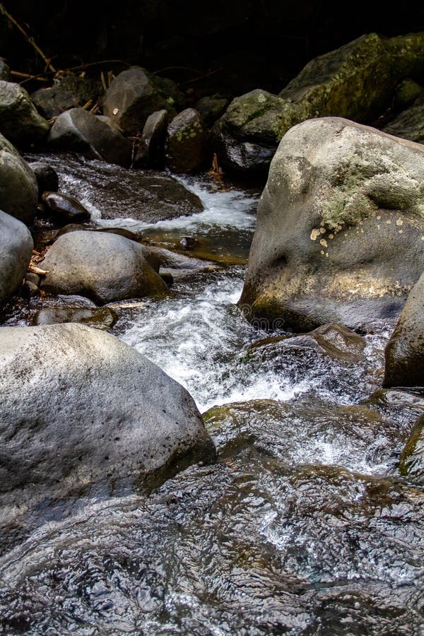 The Flow of River Water Flowing through the Rocks Stock Photo - Image ...