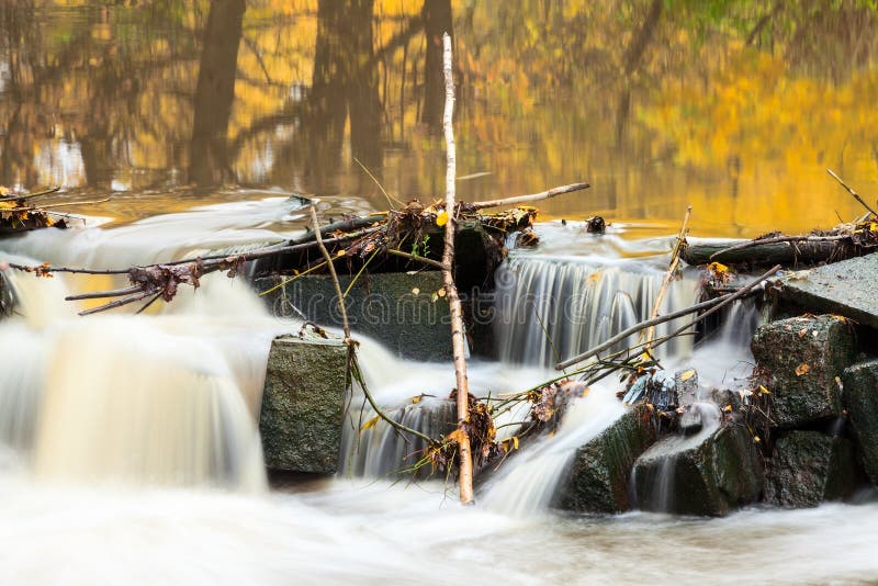 Flow of River Water through Stones at Autumn, Long Exposure Stock Image ...