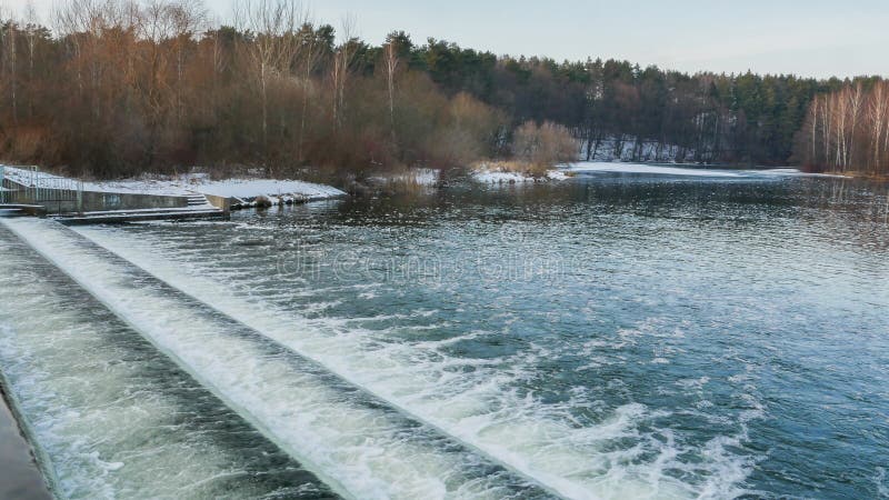 The Flow of Water from the Lake through the Dam. Stock Photo - Image of ...