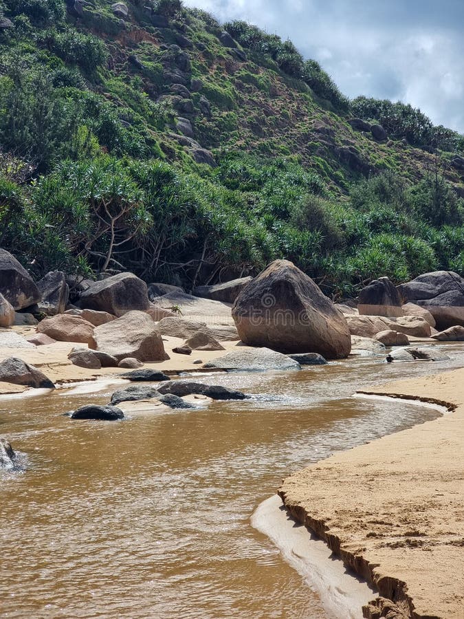 Sandy beach stock photo. Image of rock, wave, terrain - 333498934