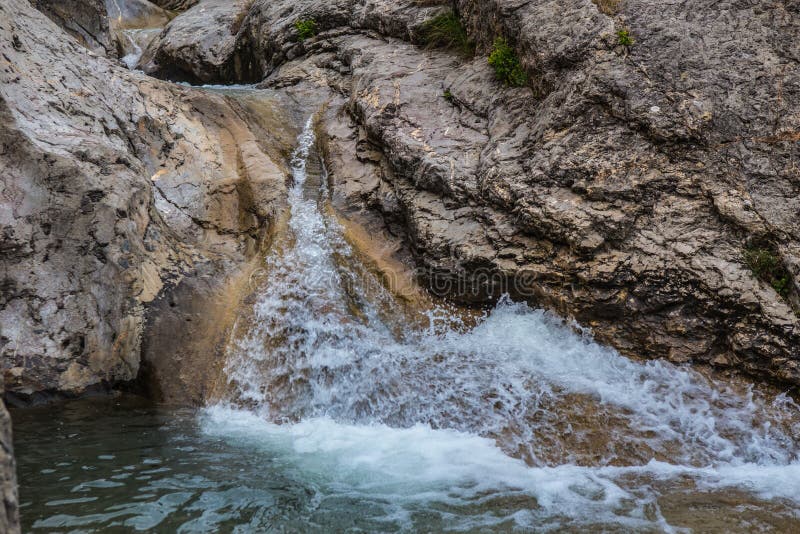 Flow of Water between the Rocks of a Mountain Stream Stock Photo ...