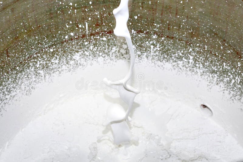 Flow of white paint stock photo. Image of milk, indoors - 17989774