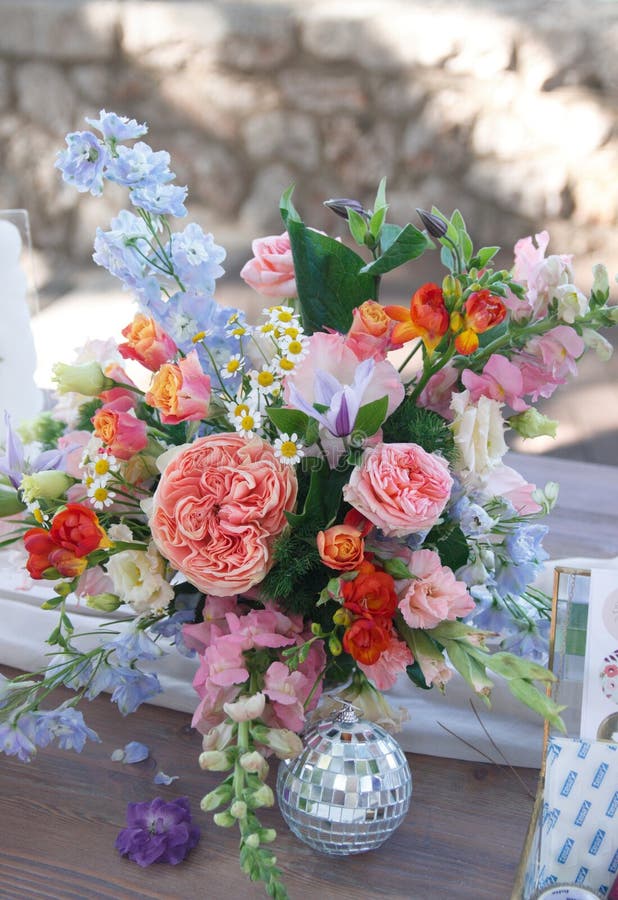 Flower arrangement stock image. Image of candles, table - 325235425