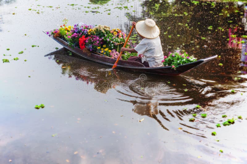 Flower boat editorial stock image. Image of canal, people - 28857299