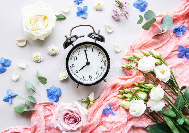Flower Composition and Alarm Clock Stock Photo - Image of blossom ...