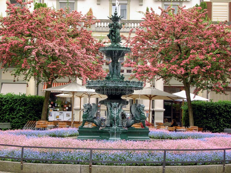 Flower Fountain in the Spring Stock Photo - Image of blooming, lions ...