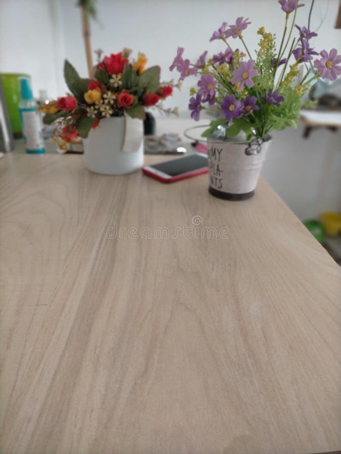 Flower and Handphone on the Table Stock Photo - Image of room, floor ...