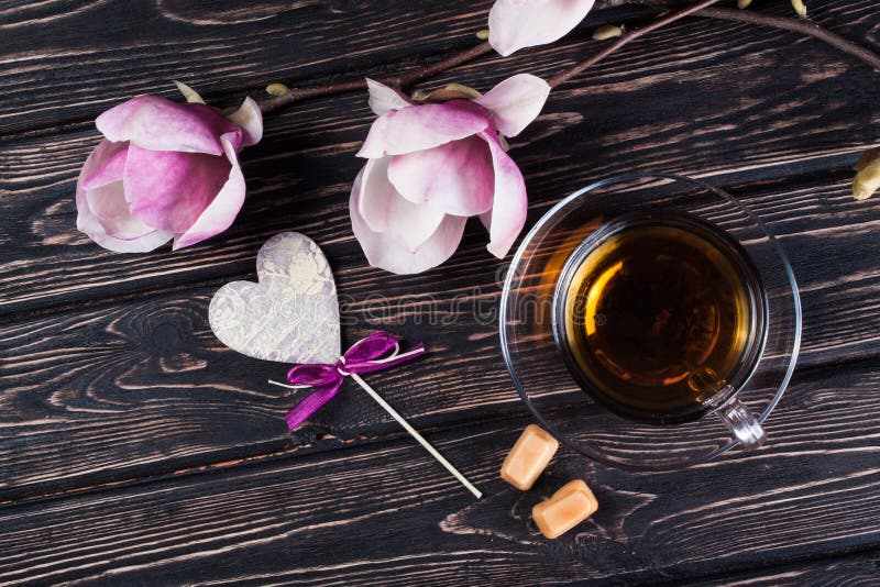 Flower Magnolia and Cup of Black Tea Stock Photo - Image of table ...