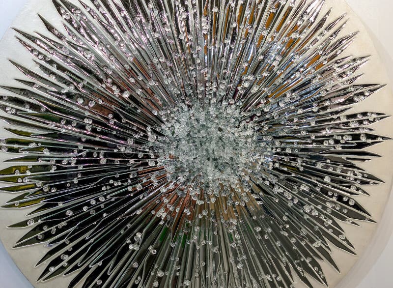A Flower Pattern Composed of Long, Sharp, Mirrored Glass Lines Stock ...