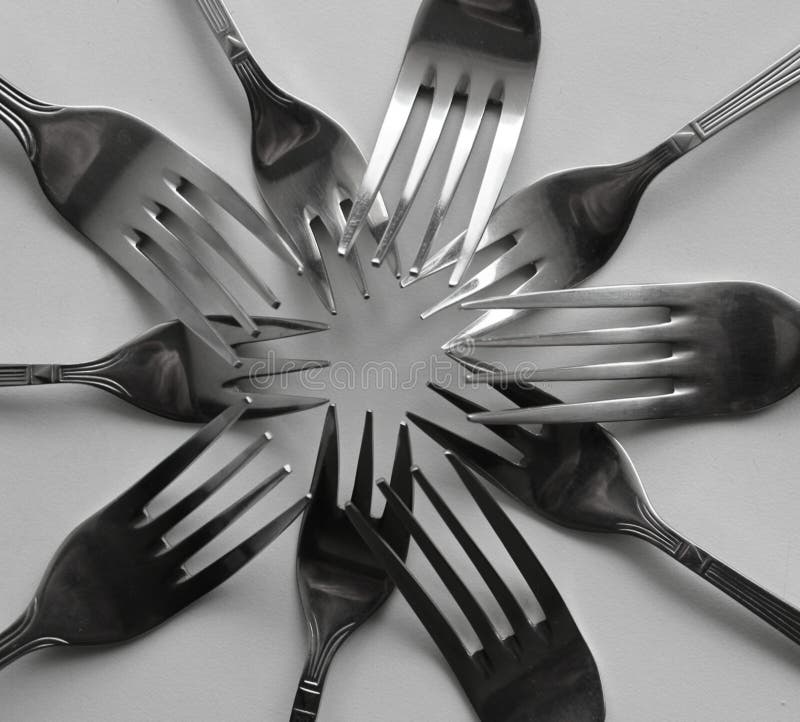 Flower Pattern Made with Variety Size Forks on White Background Stock ...