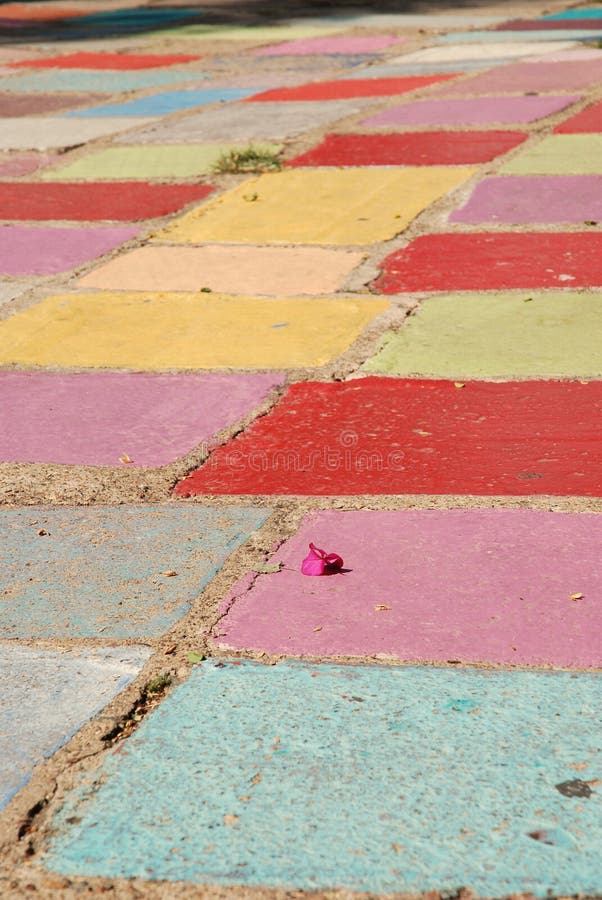 Flower Petal in a Field of Colored Tiles Stock Image - Image of ...