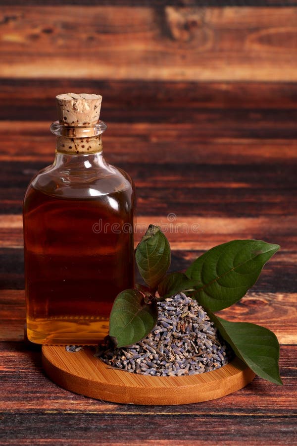 Flower seeds and oil stock photo. Image of shot, bottle - 138640532