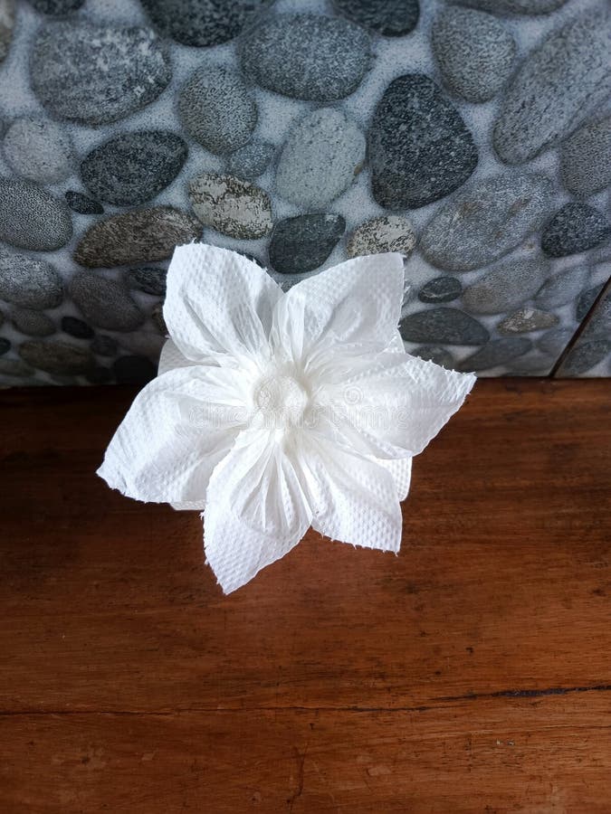 Flower shaped toilet tissu stock image. Image of toilet - 383293815