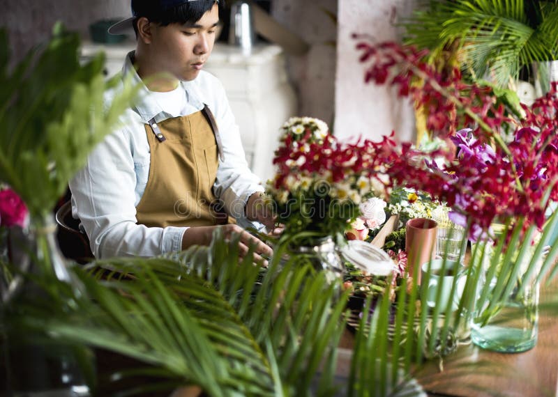 Flower Shop Business Owner Working among the Flower Stock Photo - Image ...