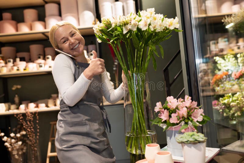 Flower Shop Manager Takes Orders by Phone Stock Image - Image of owner ...