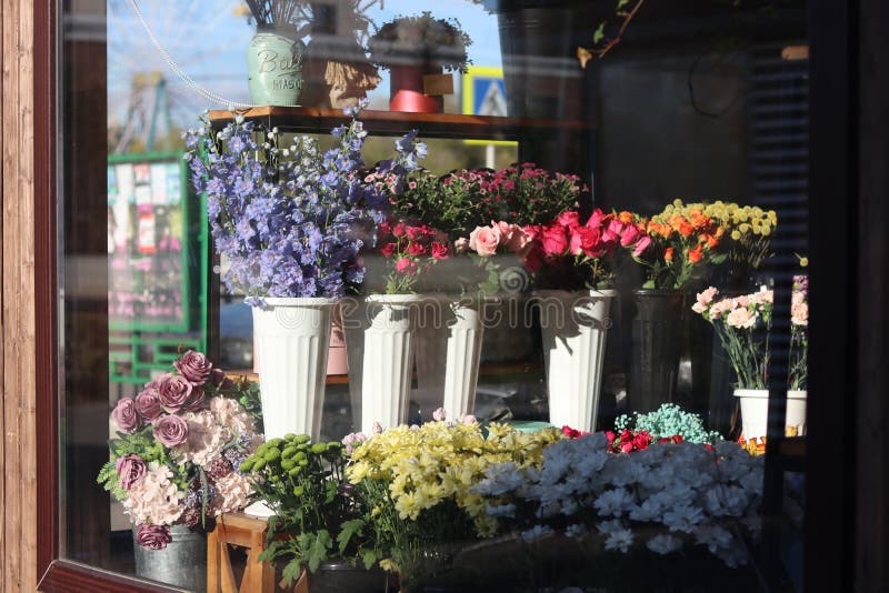 Flower shop showcase stock photo. Image of marketplace - 233174352